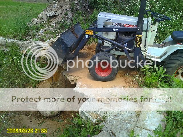 1886-03 with FEL Vs. rock | My Tractor Forum