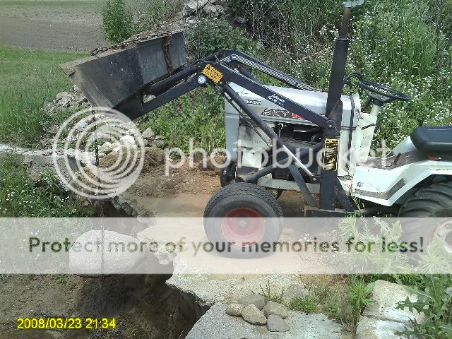 1886-03 with FEL Vs. rock | My Tractor Forum